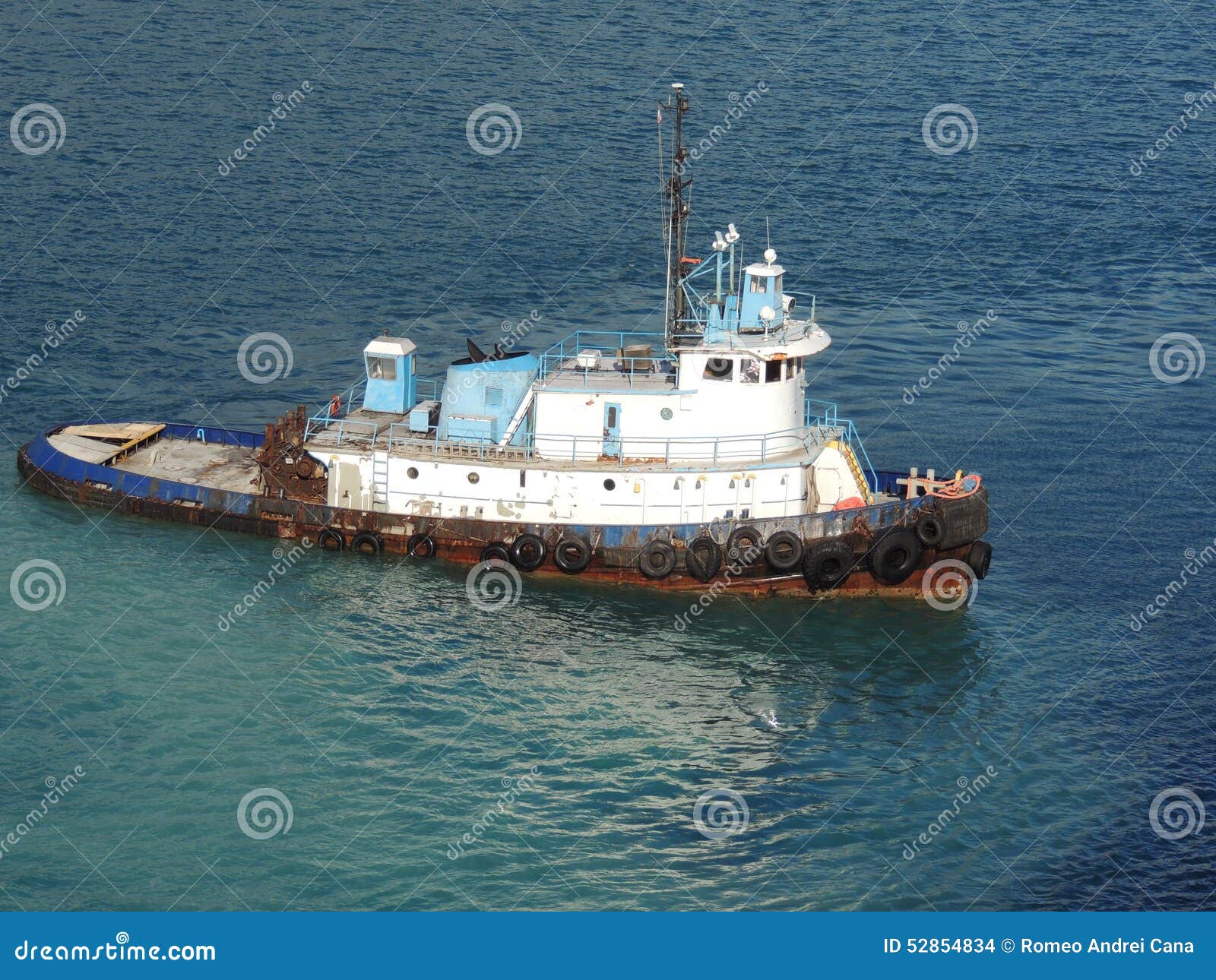 Old Tugboat Sailing Close To Shore Stock Photo - Image of caribbean ...