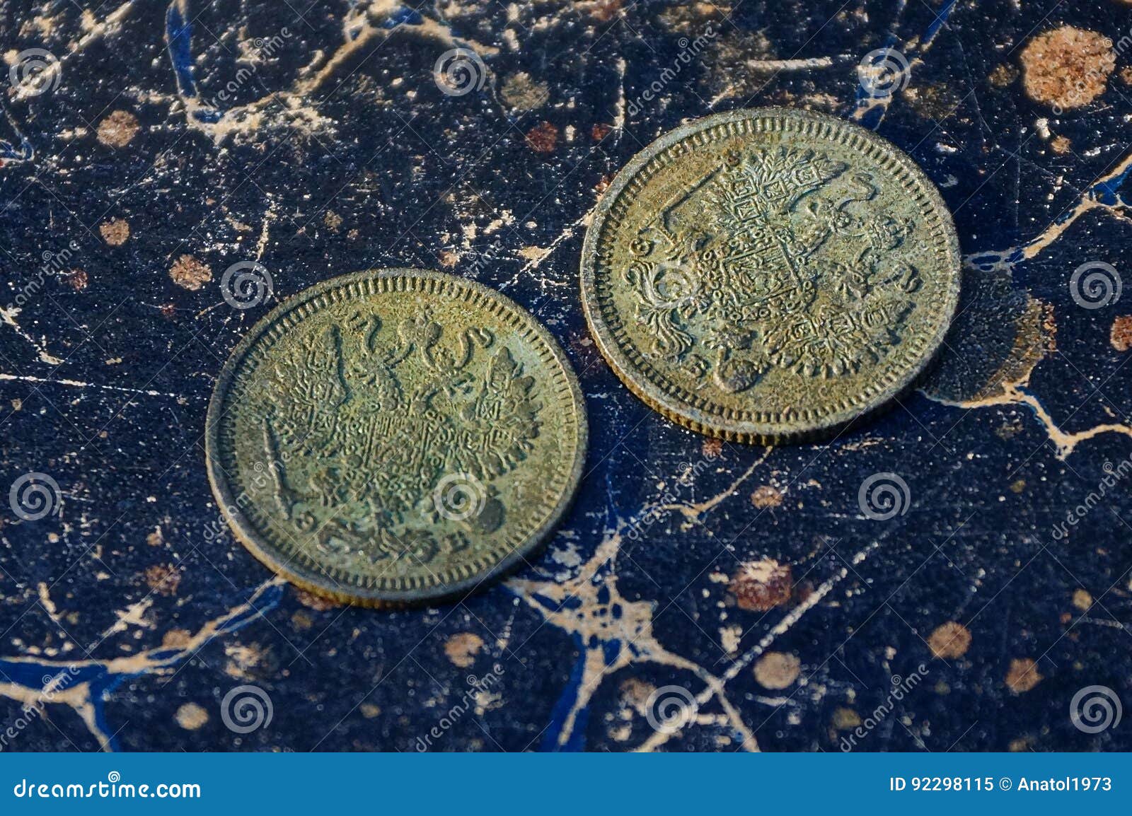 Old Two Silver Coin on a Blue Background Stock Image - Image of blue ...
