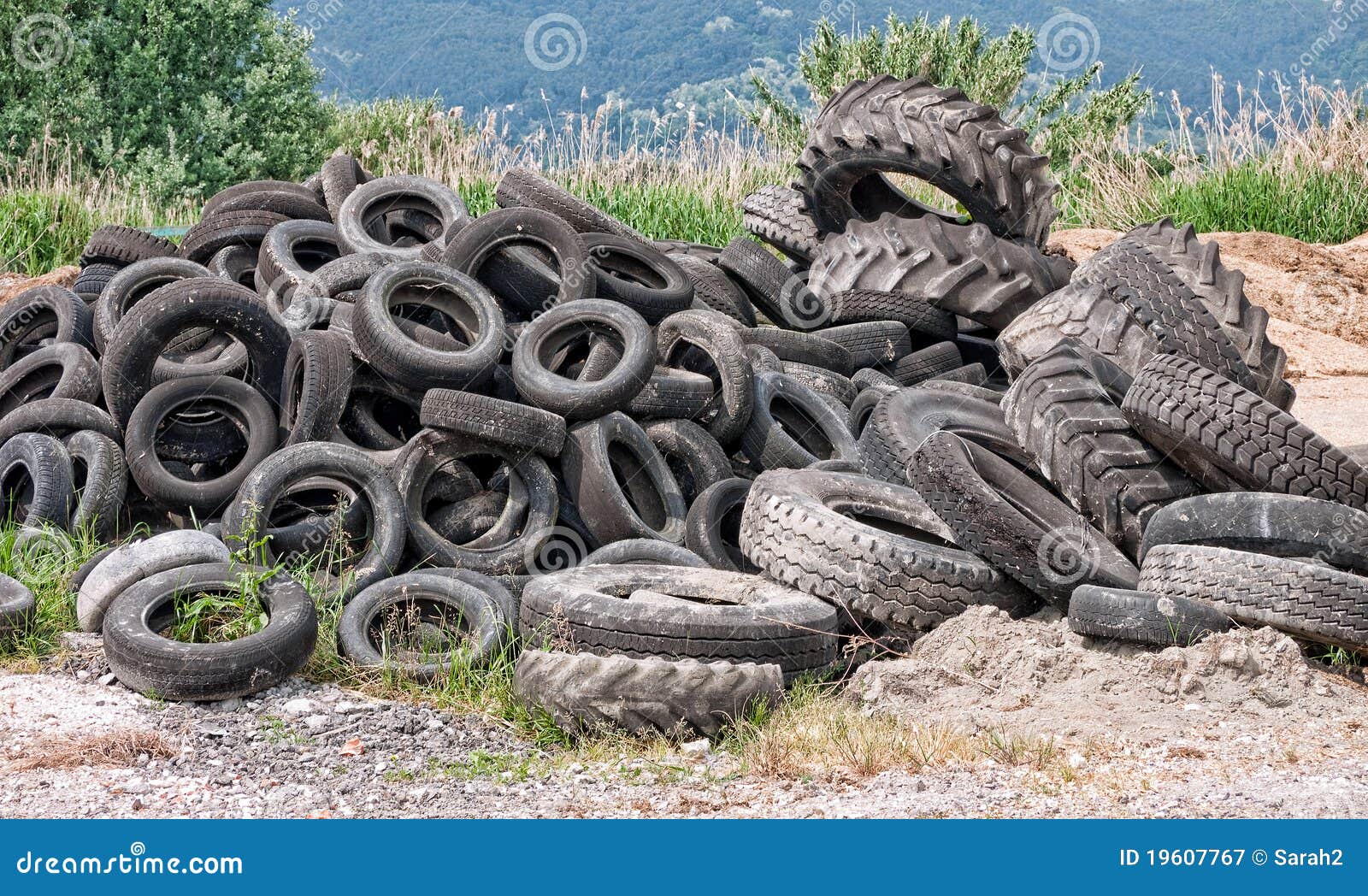 Dumped Car Tyres. Fly-tipping Old Tyre Waste And Rubber Recycling ...