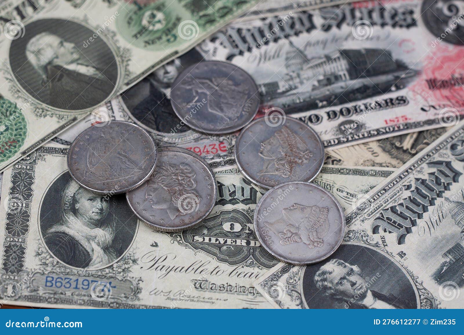 Old US Banknotes and Silver Certificates with Silver Dollar Coins Stock ...