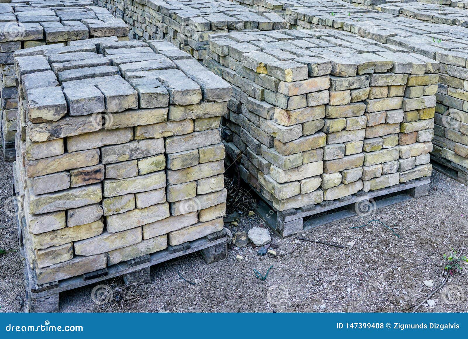 Old Used Bricks, Stacked Into Cubes On Pallets Stock Photo ...