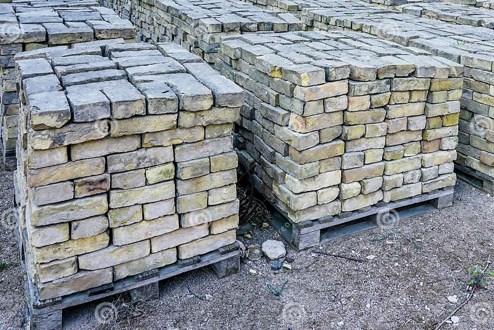 Old Used Bricks, Stacked into Cubes on Pallets Stock Photo - Image of ...
