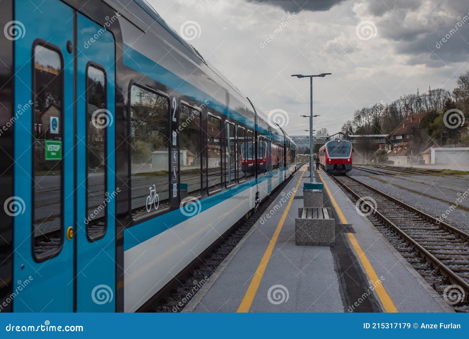 Old Versus New Passenger Train Standing on a Platform. Concept of ...