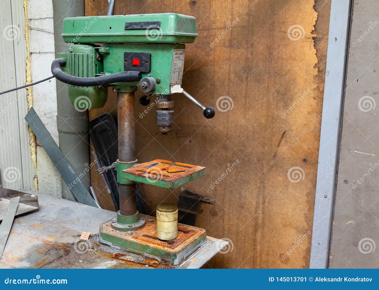 Old Vertical Green Drilling Machine with a Big Red Power Button and ...