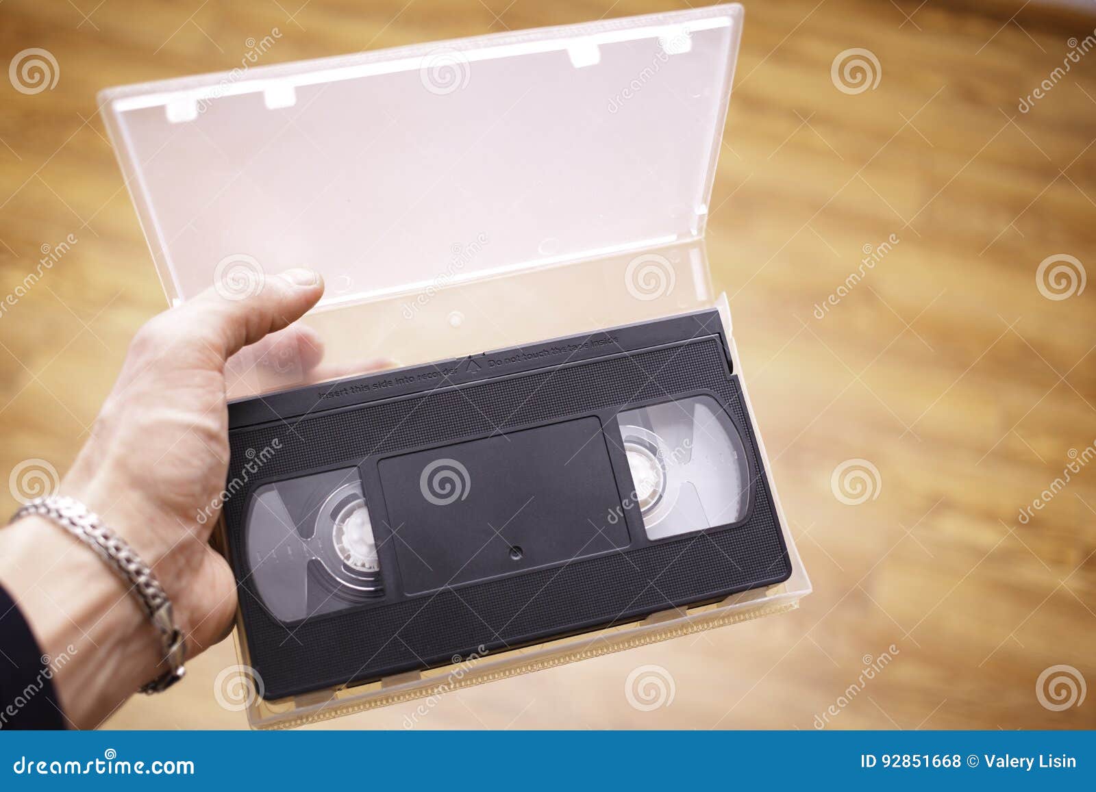 Old VHS On The Hand Stock Photo | CartoonDealer.com #92851668