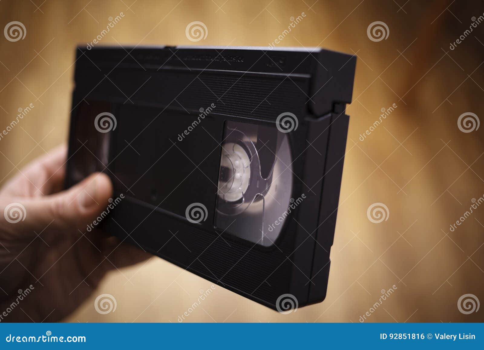 Old VHS on the hand stock photo. Image of closeup, magnetic - 92851816