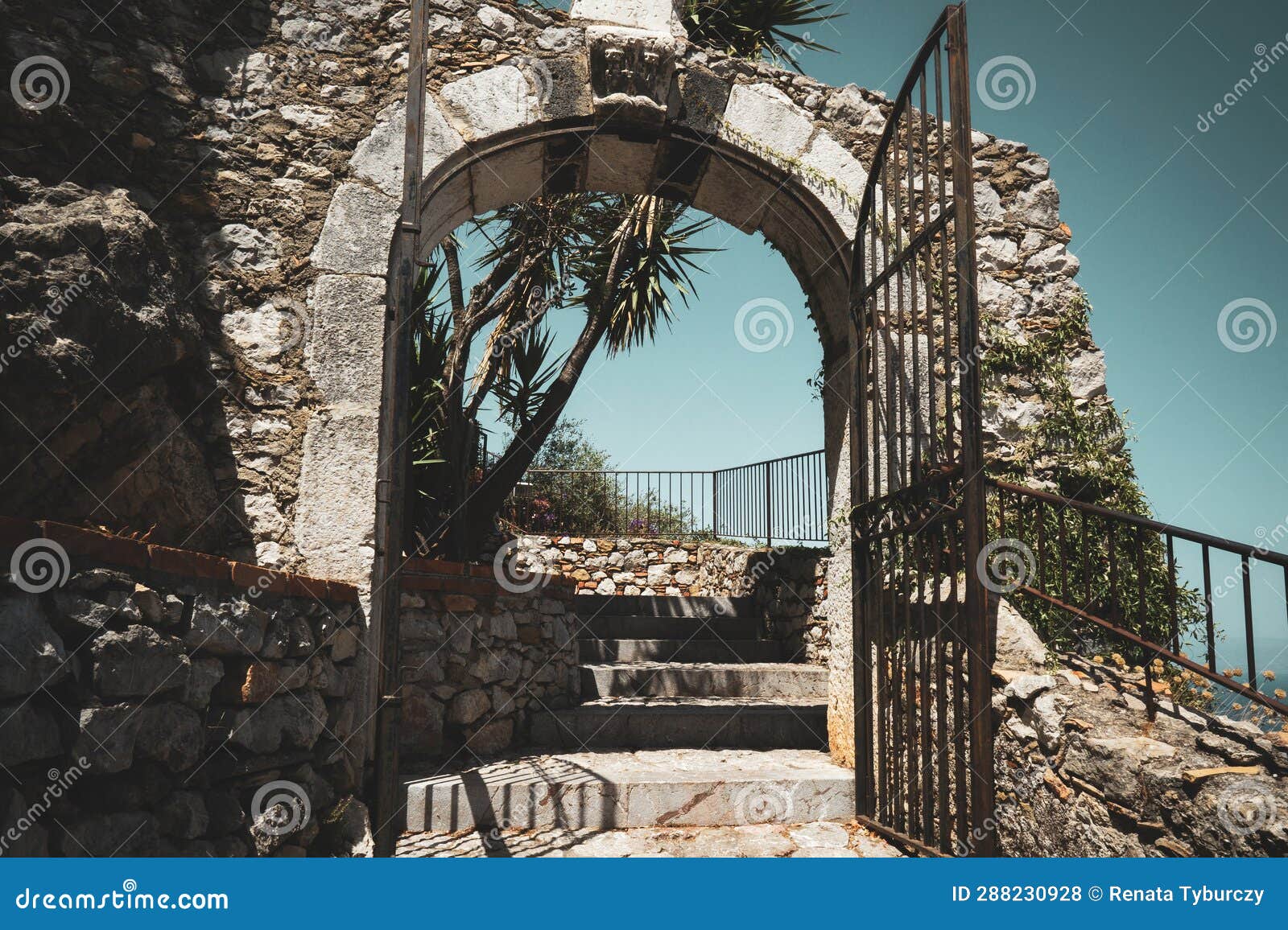 Old, Vintage Aged Stone Wall with Arched Opening Gate and Stairs Up ...