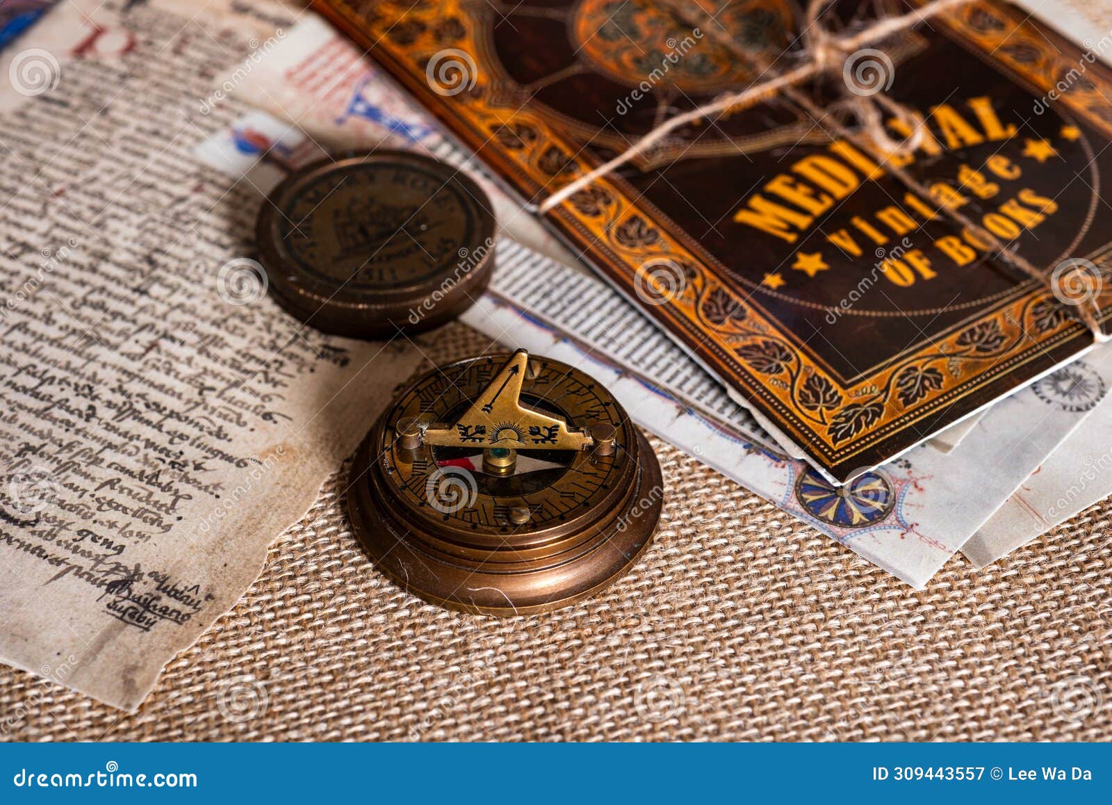 Old Vintage Brass Compass with Sundial Lying on a Very Old Medival Hand ...