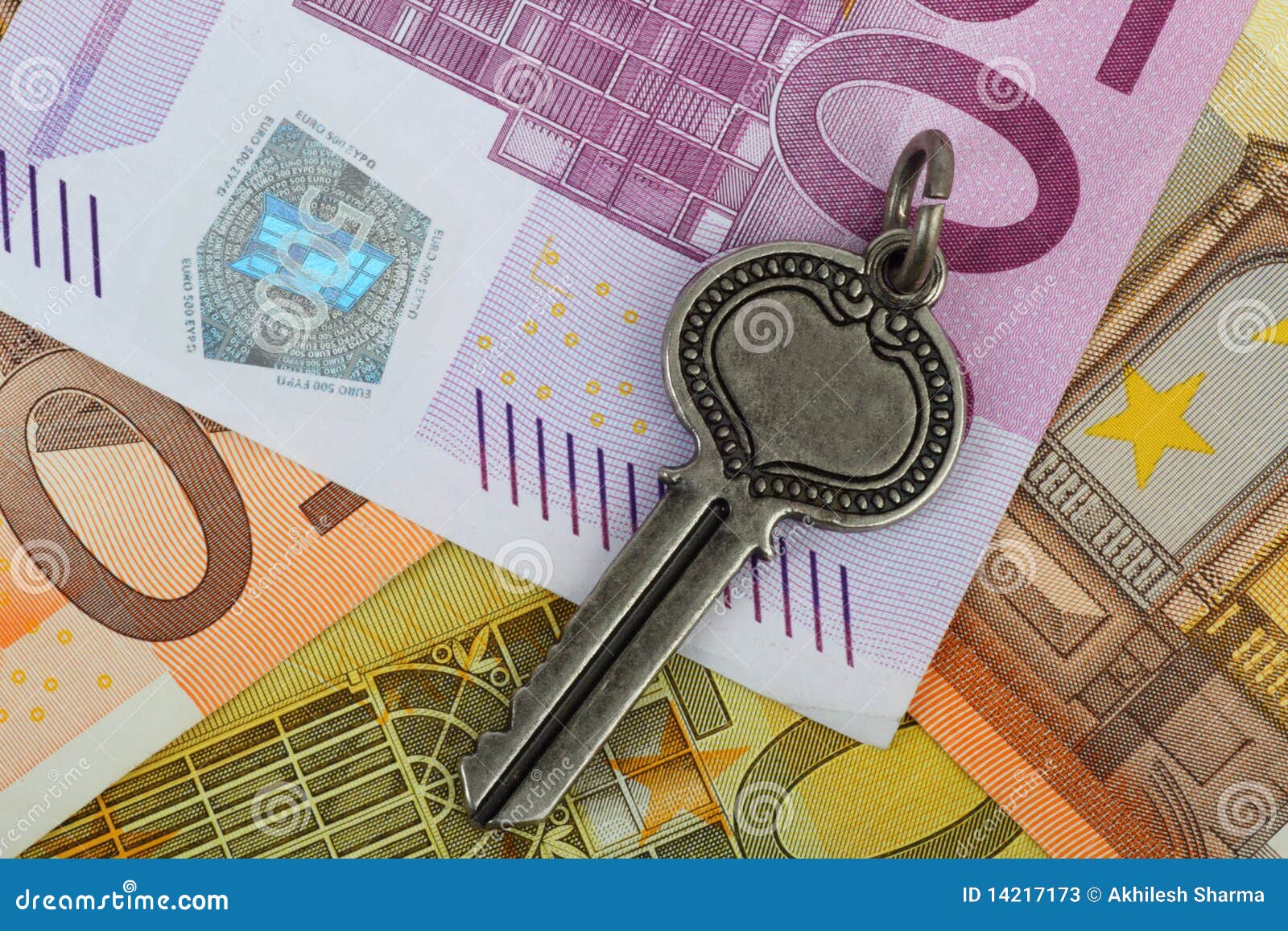 Old vintage key on Euro stock image. Image of euro, estate - 14217173