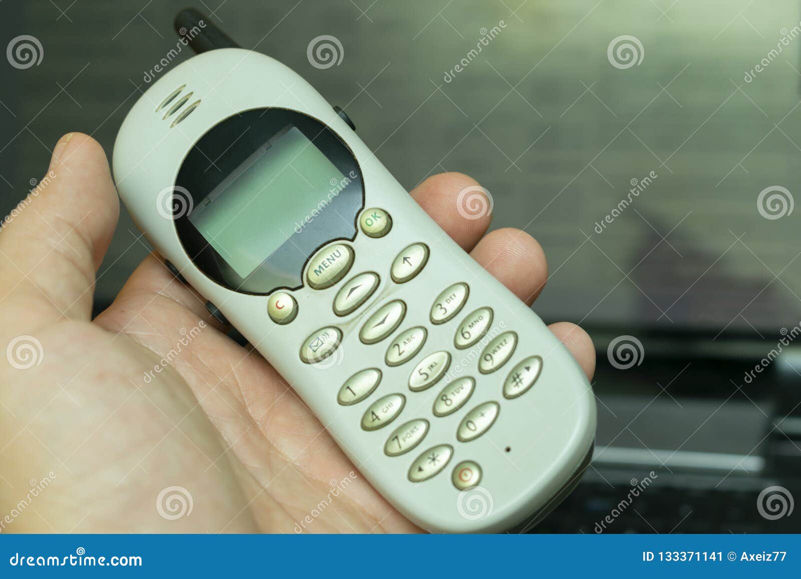 Old Vintage Push-button Cordless Phone In Hand, Royalty-Free Stock ...