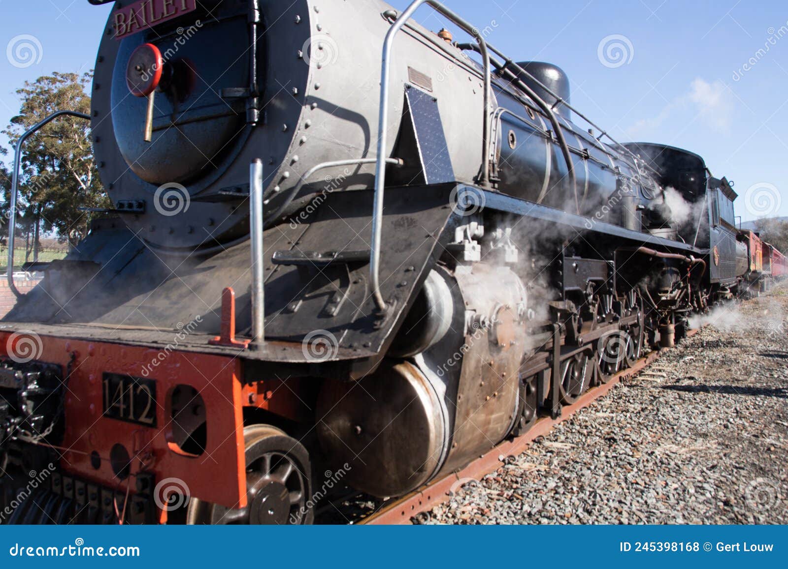 Old Vintage Steam Train Engine Standing on Tracks Warmin Up. Stock ...