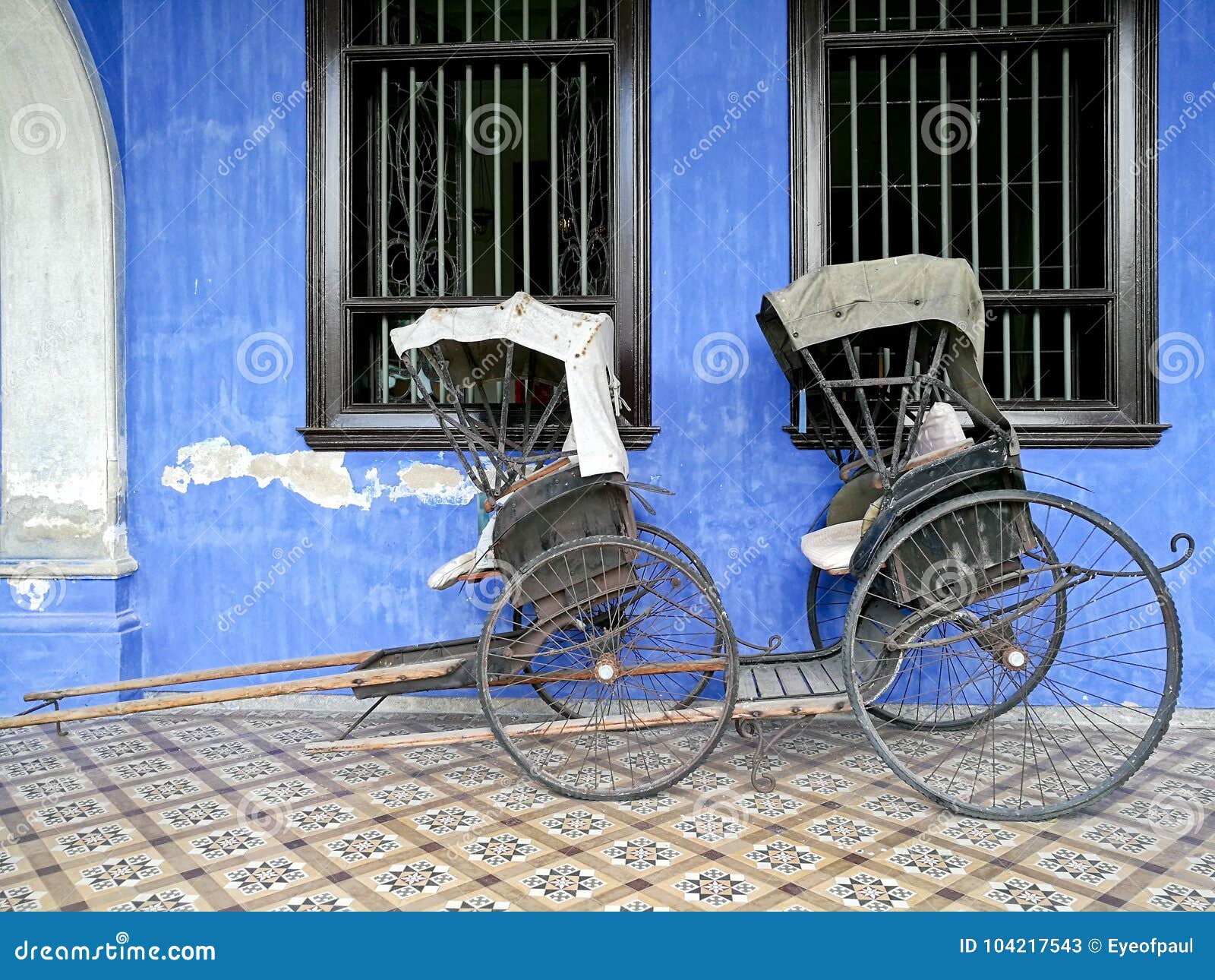 Old Vintage Traditional Rickshaws in Front of Blue Building in P Stock ...