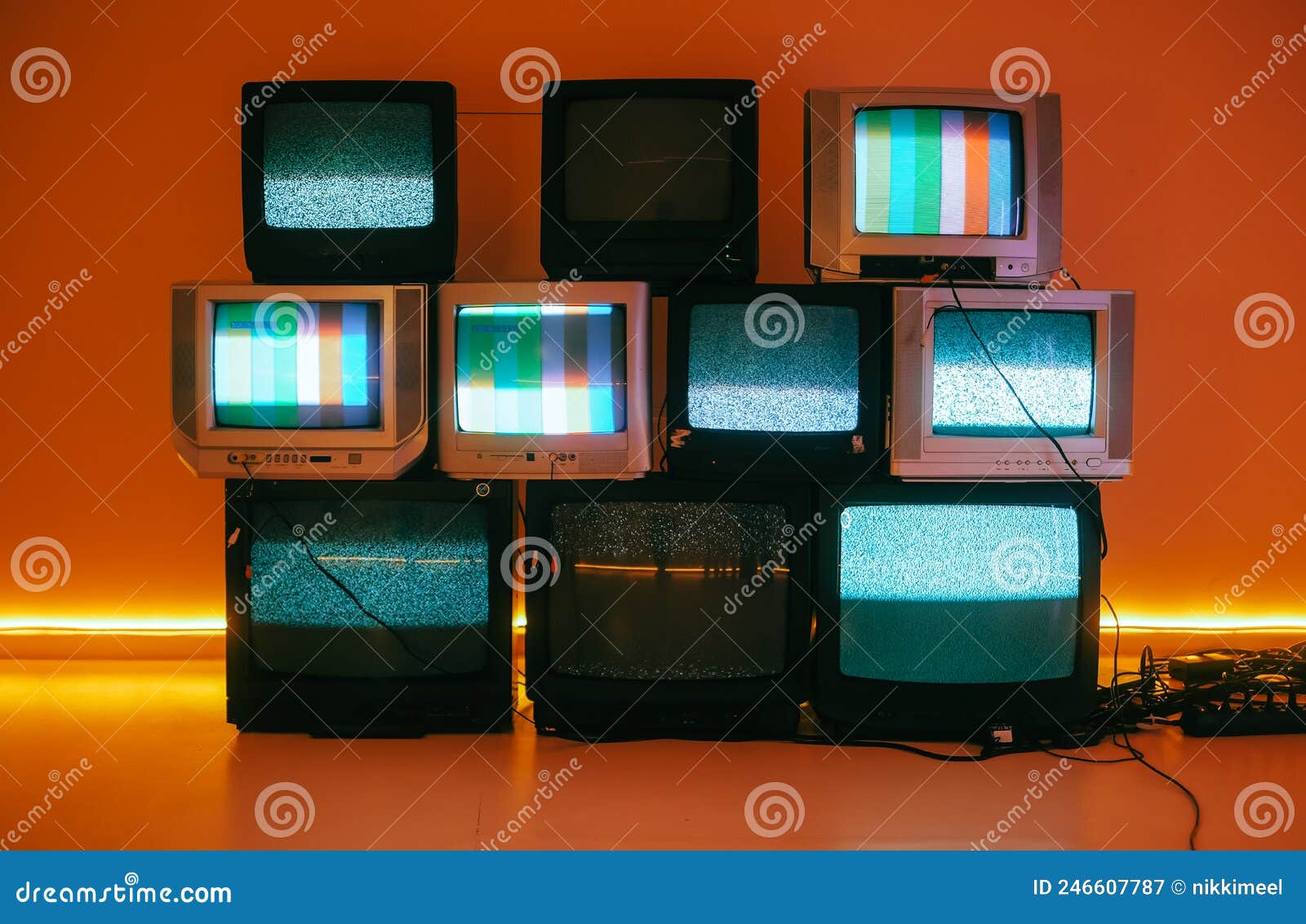 Old Vintage Tvs on a Floor in a Room with Colored Neon Light Stock ...