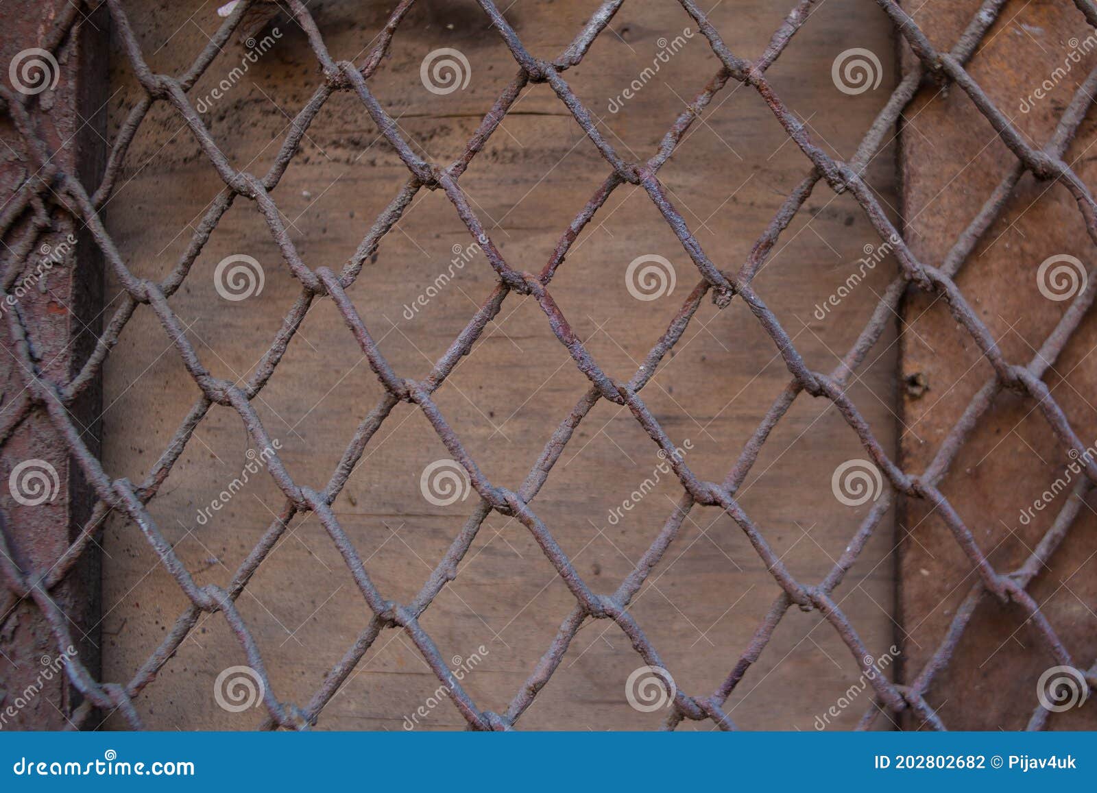 Old Vintage Wood Panel with Iron Grid Pattern. Mesh Fabric Stock Photo ...