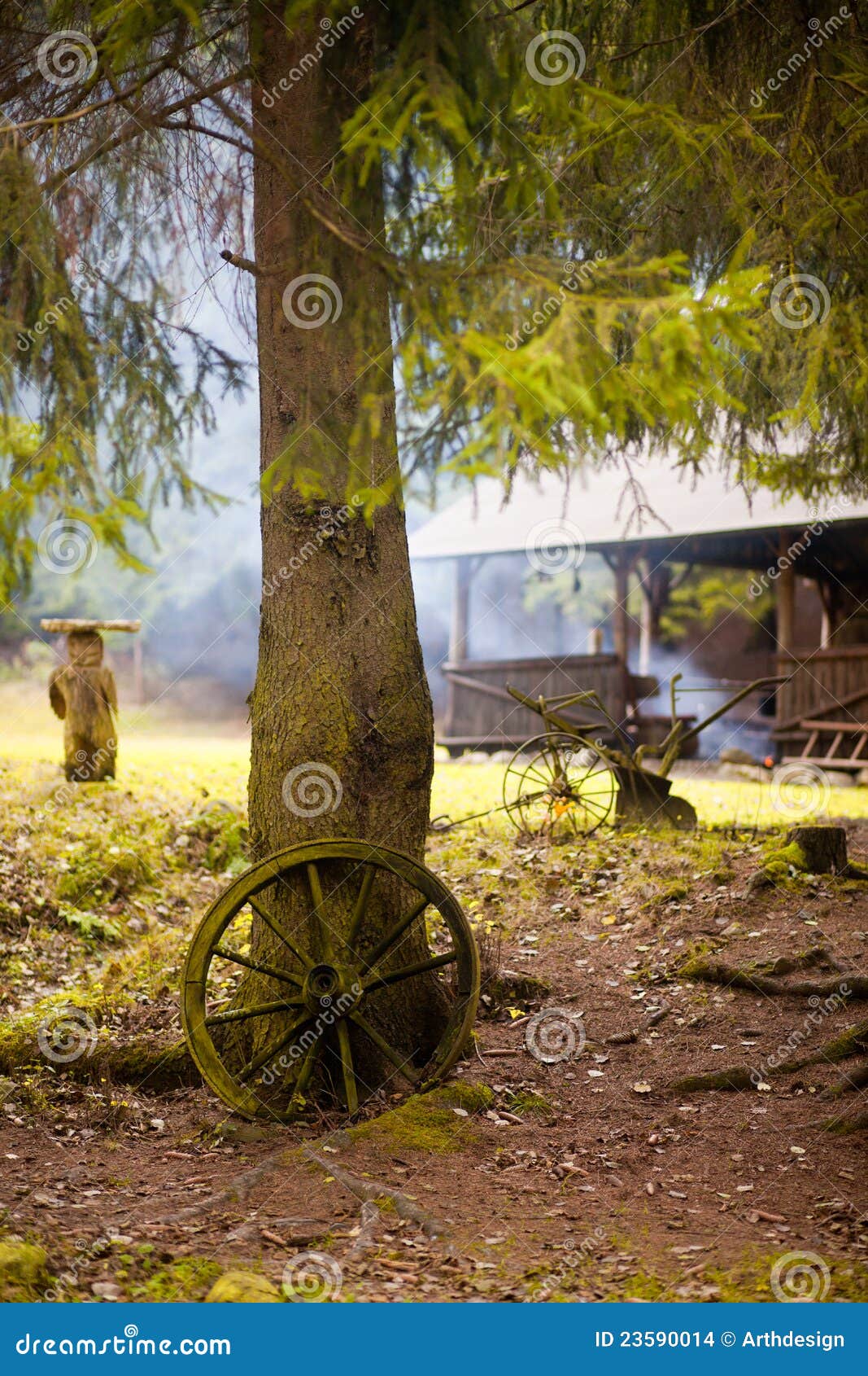 Old Wagon Wheel on the Tree Stock Photo - Image of thuringia ...