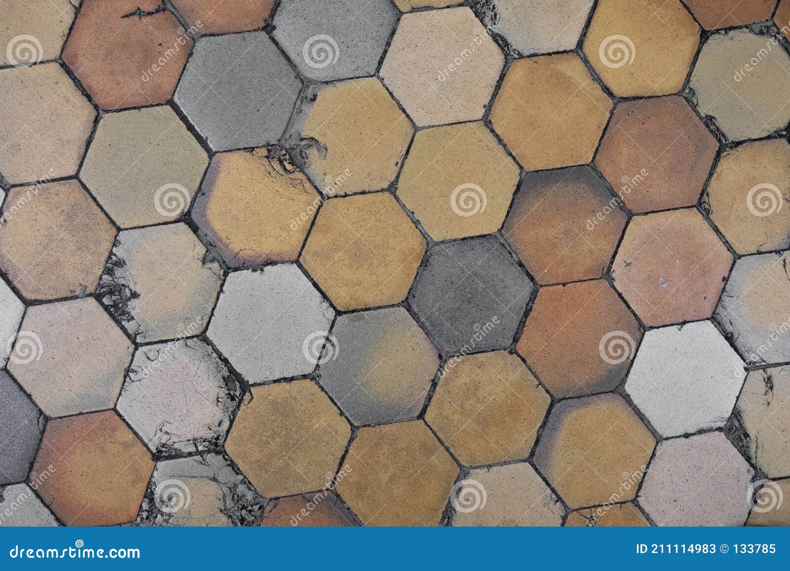 Old Wall of Gray and Yellow Hexagonal Tiles with Cracks. Rough Surface ...