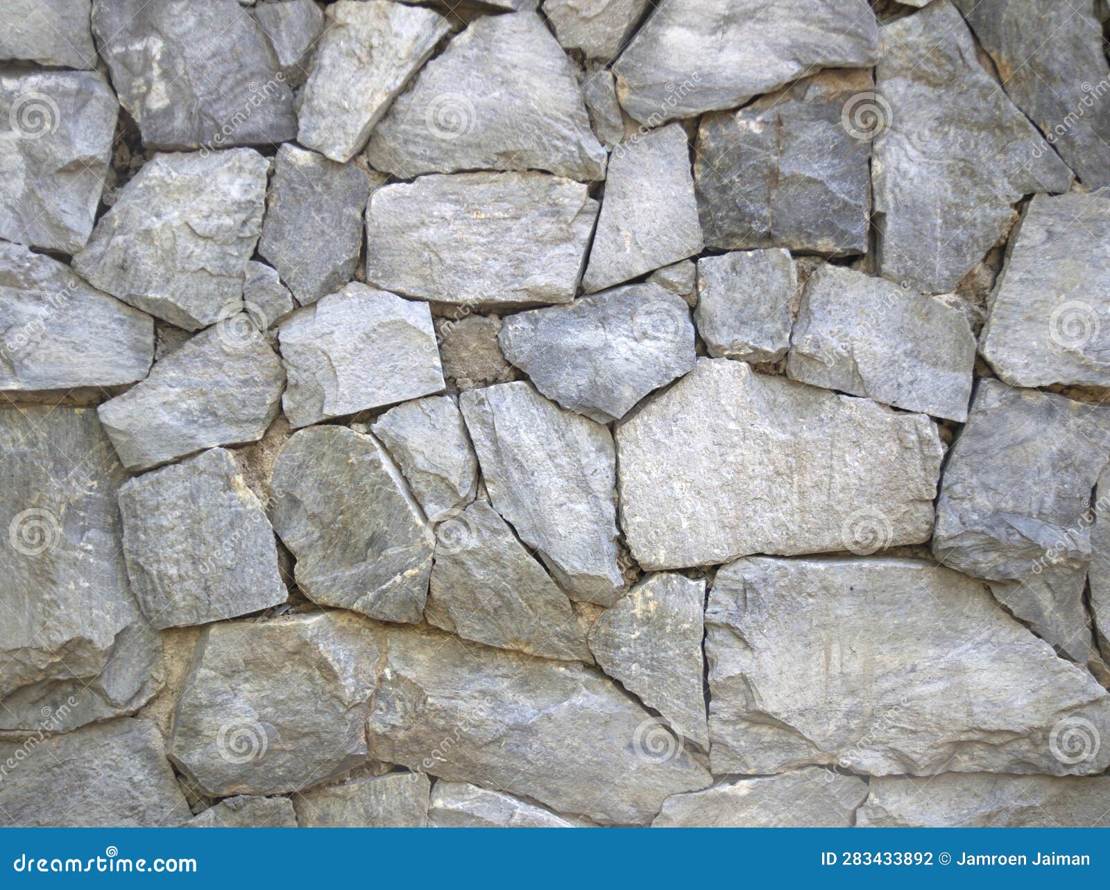 An Old Wall Made of Large Stones Lined Up Stock Photo - Image of ...