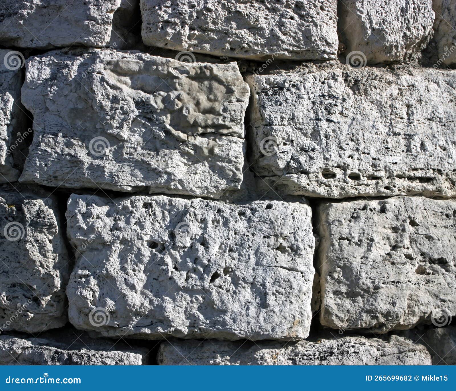 An old wall made of tuff stock photo. Image of material - 265699682
