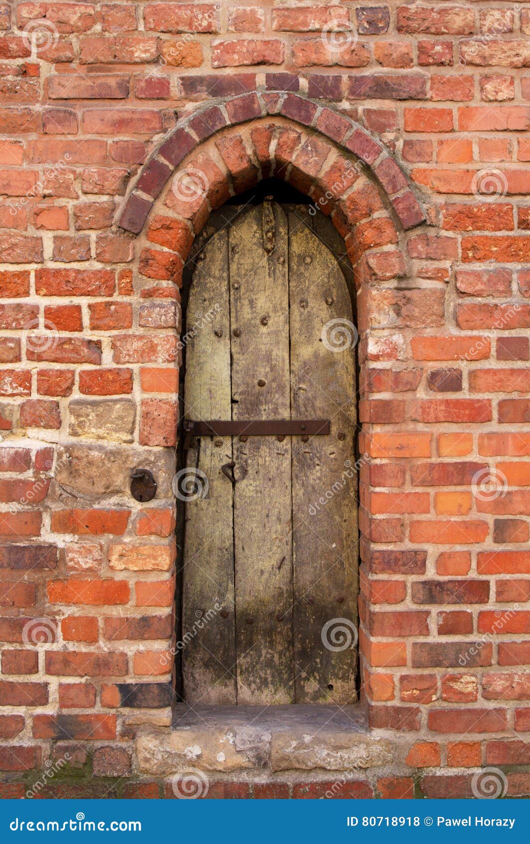 Old wall with a small door stock photo. Image of stone - 80718918