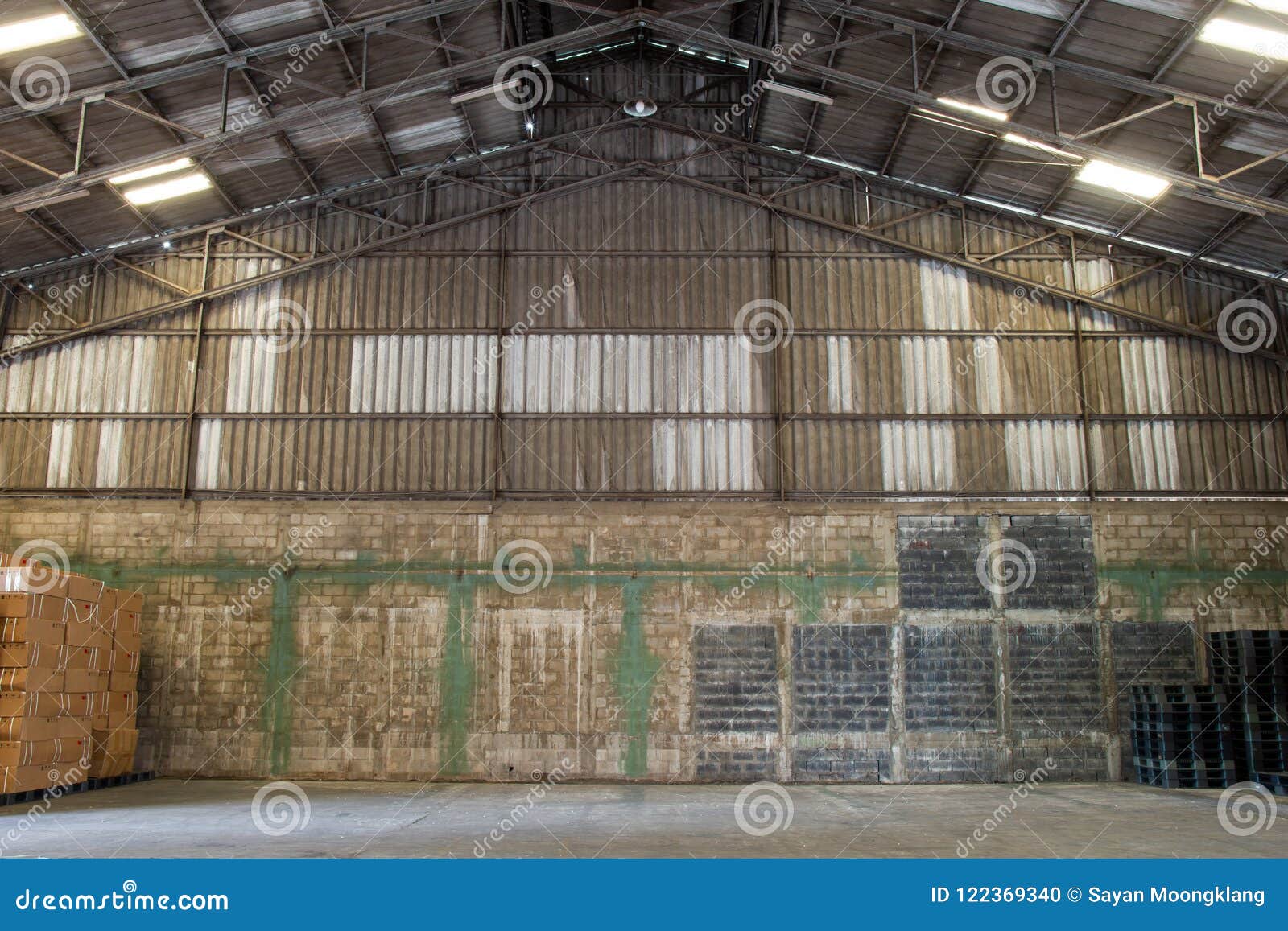 Old Warehouses with Pallets and Some Storage. Stock Photo - Image of ...