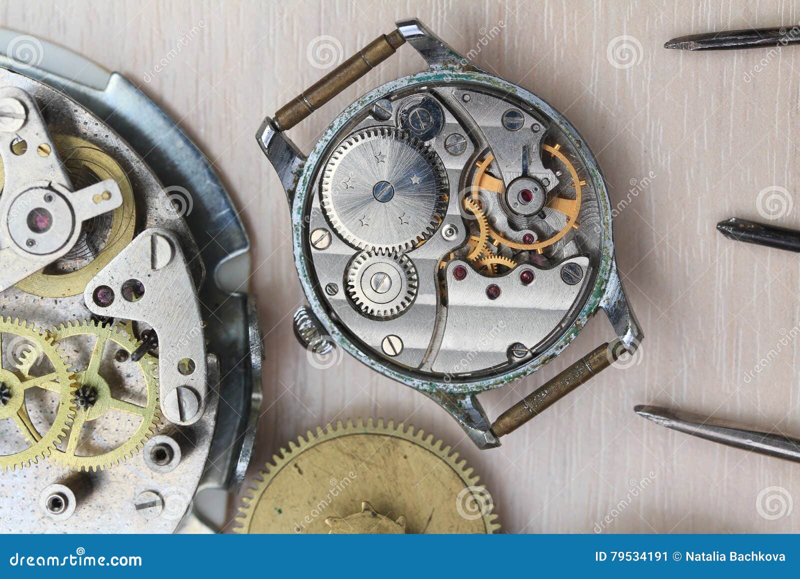 Old Watch Lying Disassembled On The Table With Repair Tools Royalty ...