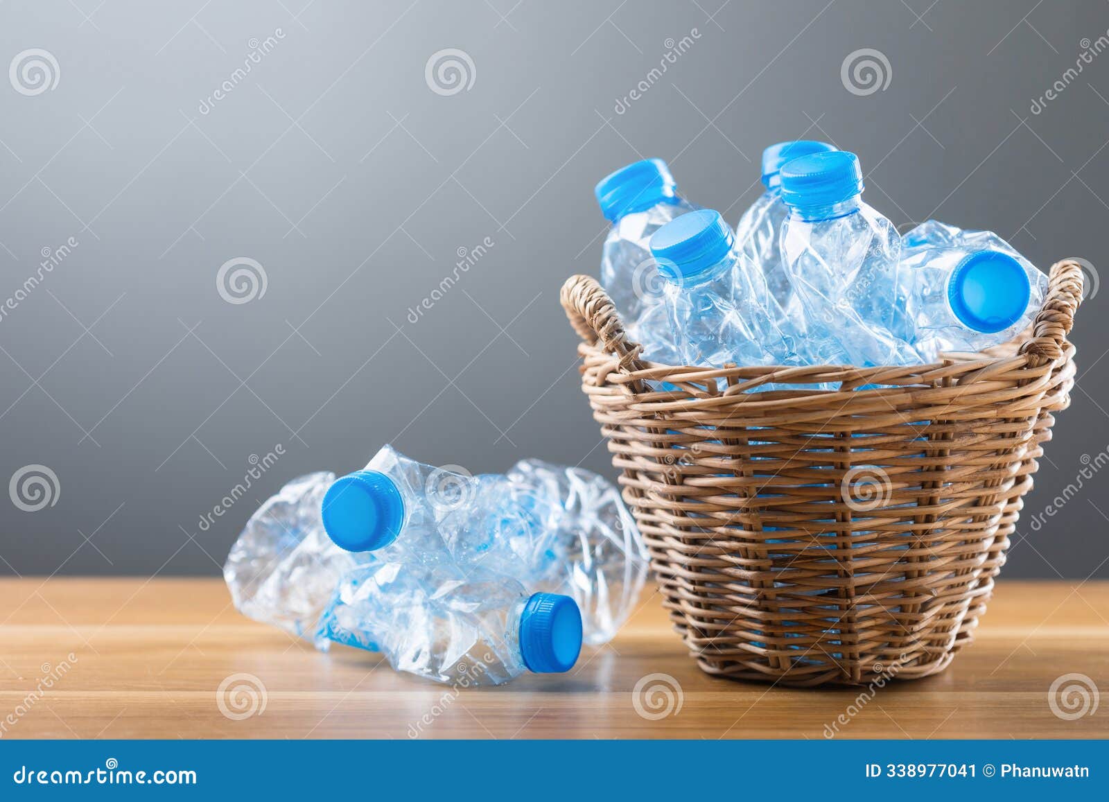 Old Water Bottles Placed in a Basket on a Table, Representing the ...