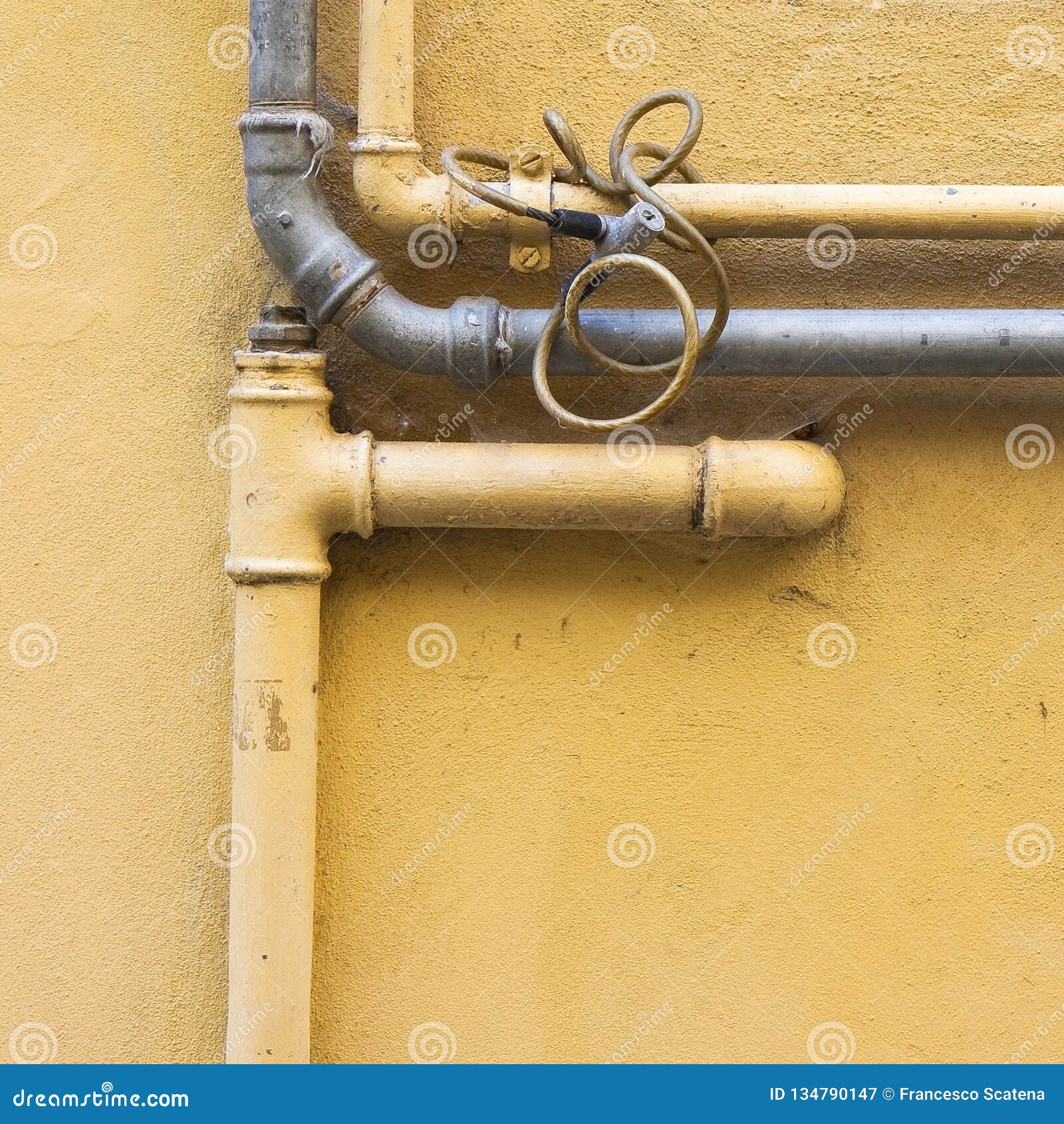 Old Water and Gas Pipes in Front of a Plaster Wall Stock Image - Image ...