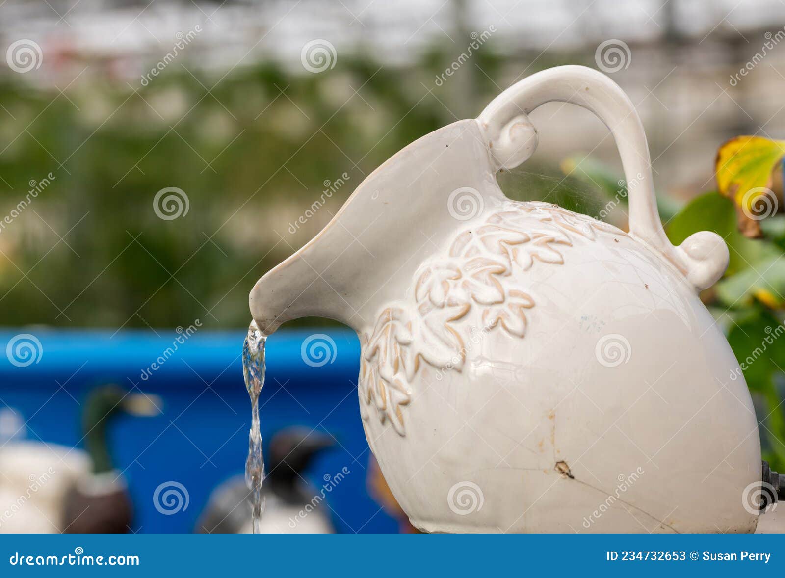 Old Water Pitcher Pouring Water Stock Image - Image of pouring, blue ...
