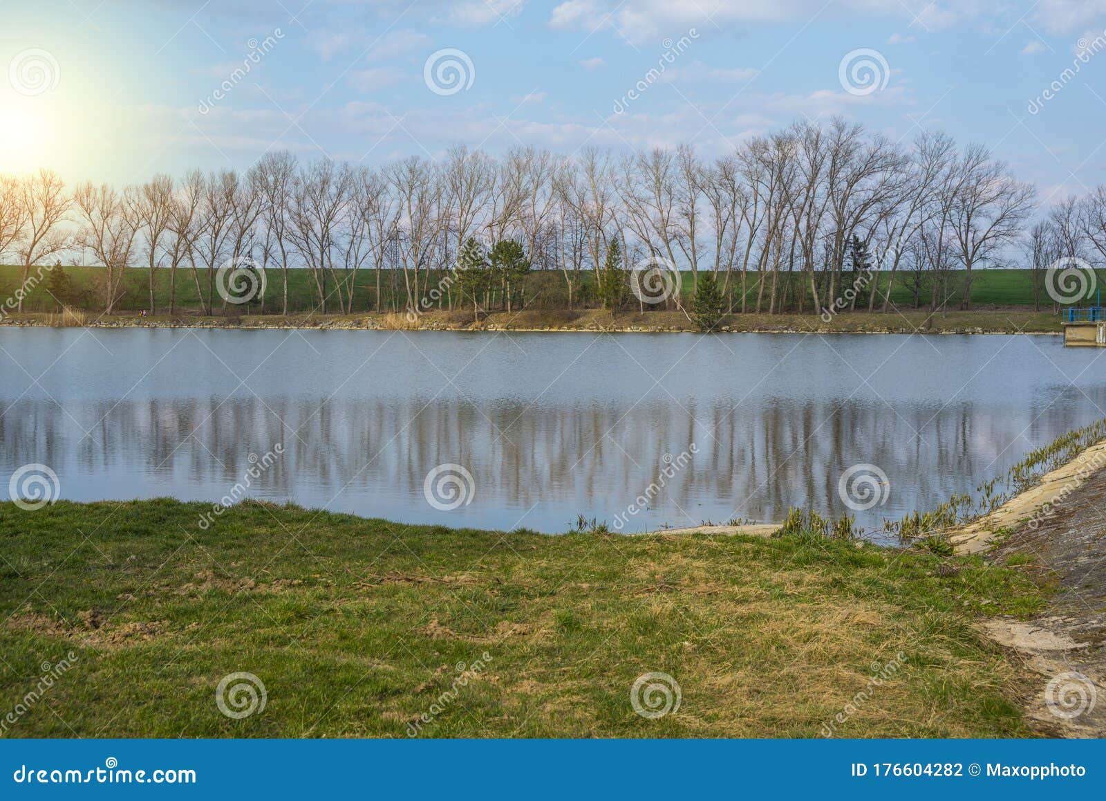 Old Water Reservoir with Trees and Sky in the Spring Stock Photo ...