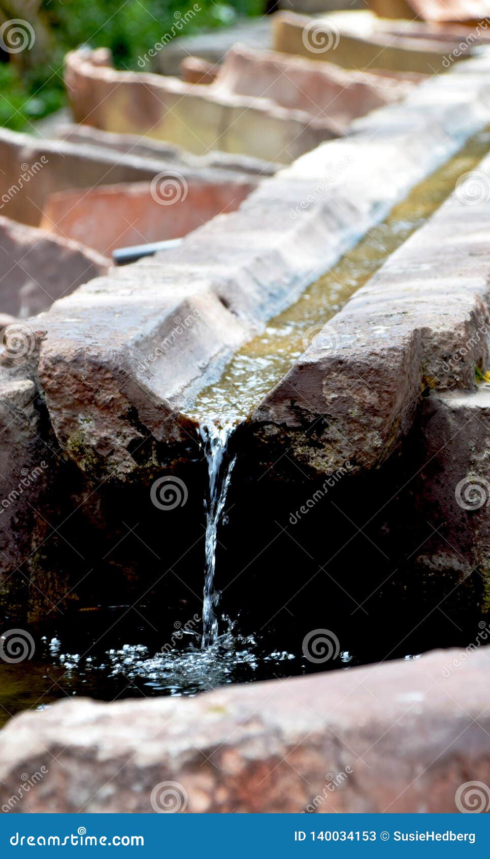 Old Water Stone Pipe with Fresh Water Running through it Stock Image ...