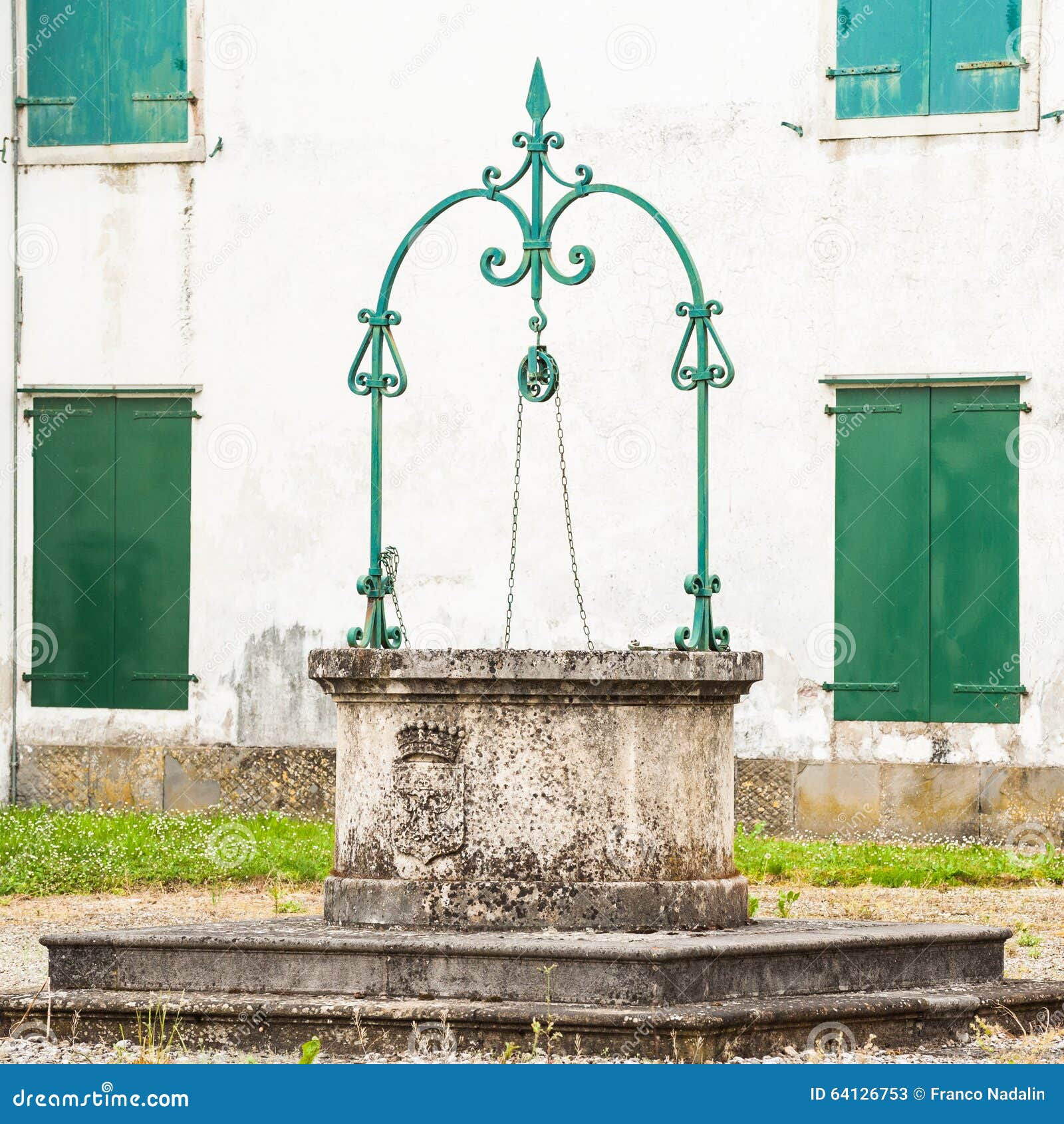 The old water well,Italy stock image. Image of grass - 64126753