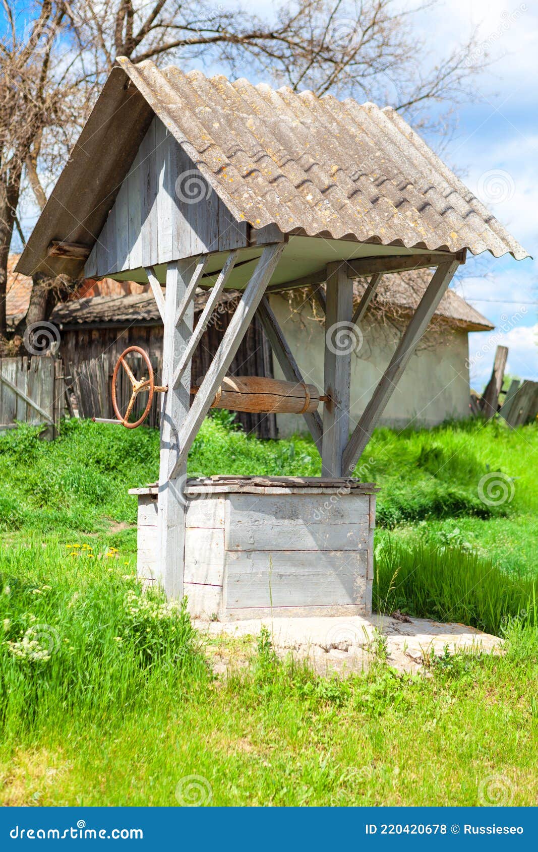 Old water well in village stock photo. Image of architecture - 220420678
