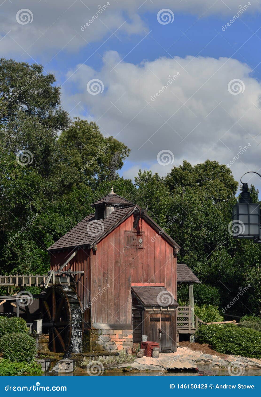 Old watermill next to lake stock photo. Image of lake - 146150428