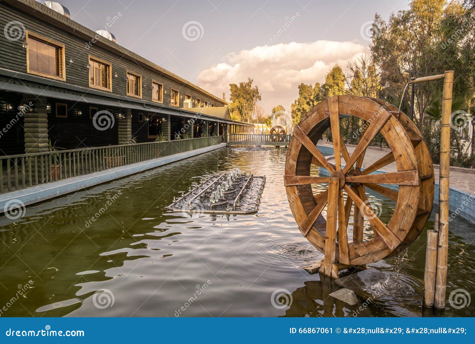 Old Waterwheel In Water Stock Image | CartoonDealer.com #66867061