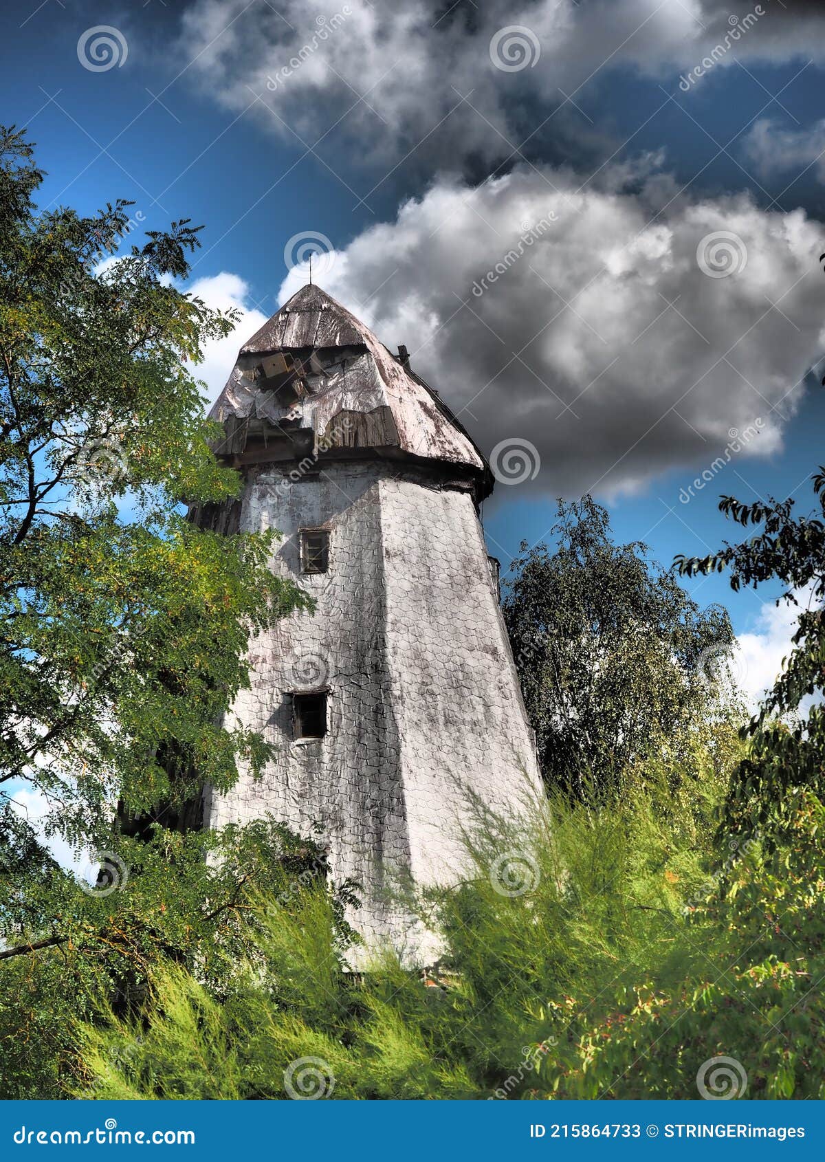 Old Weathered and Defunct Wind Mill in Dramatic Weather Stock Image ...