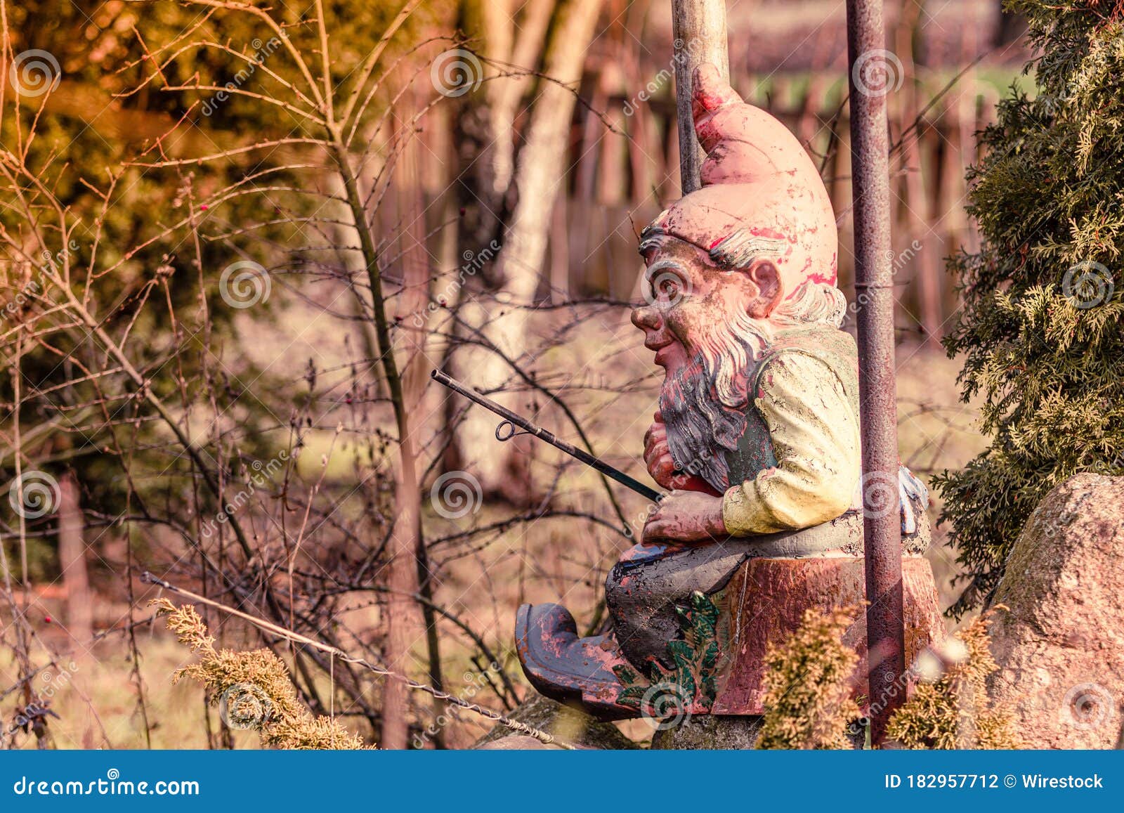 Old Weathered Fisher Dwarf Sculpture in a Forest Editorial Photography ...