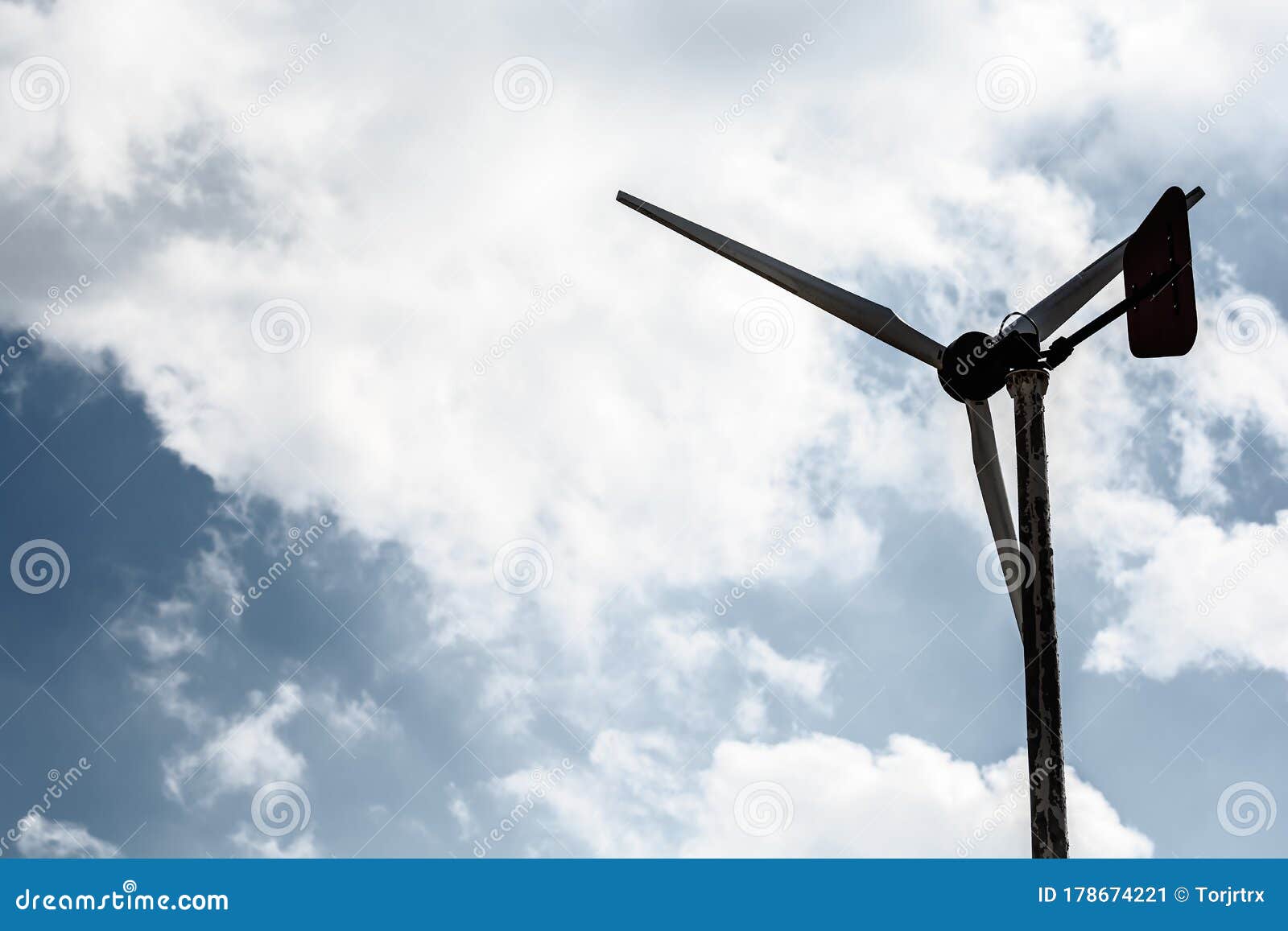 Old and Weathered Wind Turbine Generating Electricity Stock Image ...