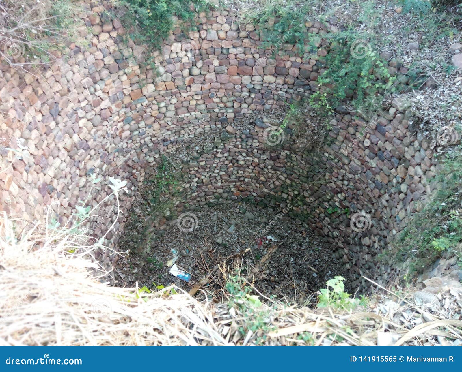 Dry water well stock image. Image of water, rocks, built - 141915565