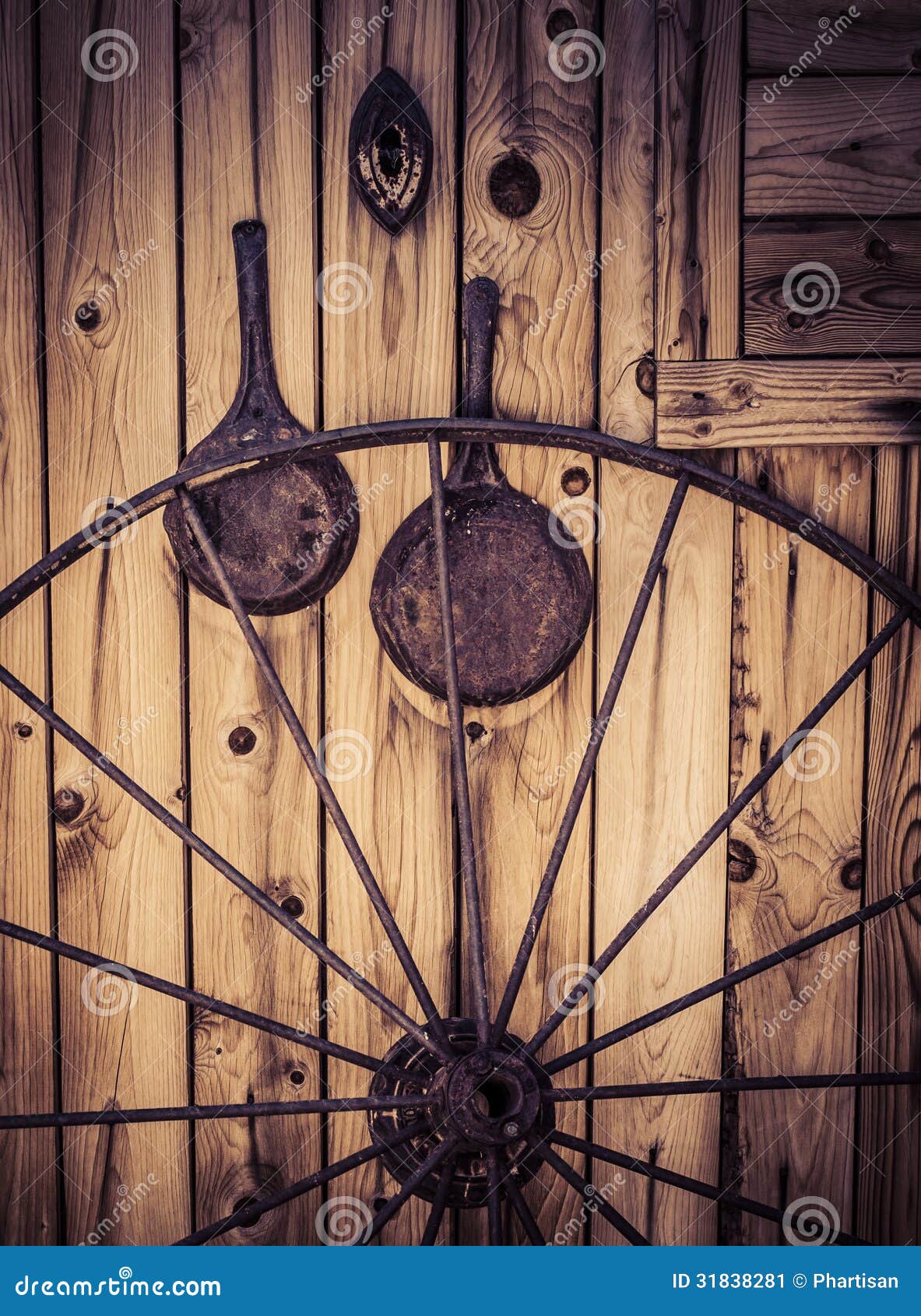 Old Western Cabin with Wagon Wheel Stock Image - Image of west, rustic ...