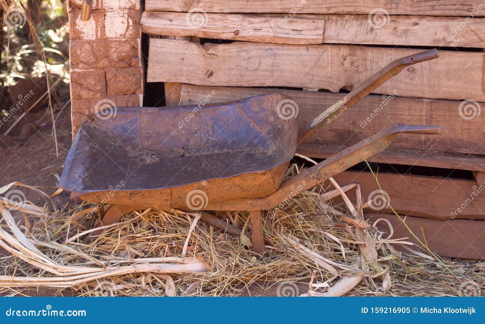 Old Wheelbarrow on a Farmyard Stock Image - Image of wood, farmyard ...