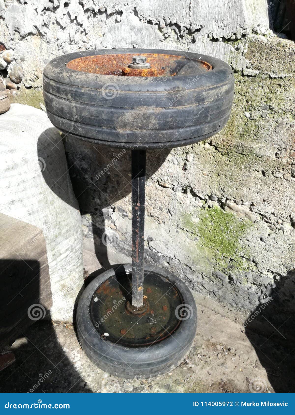 Old car axle and wheels stock photo. Image of wheel - 114005972