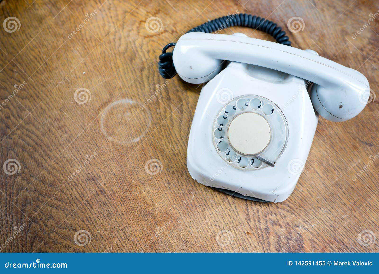 Old White Cable Telephone on Old Table Surface. Communication ...
