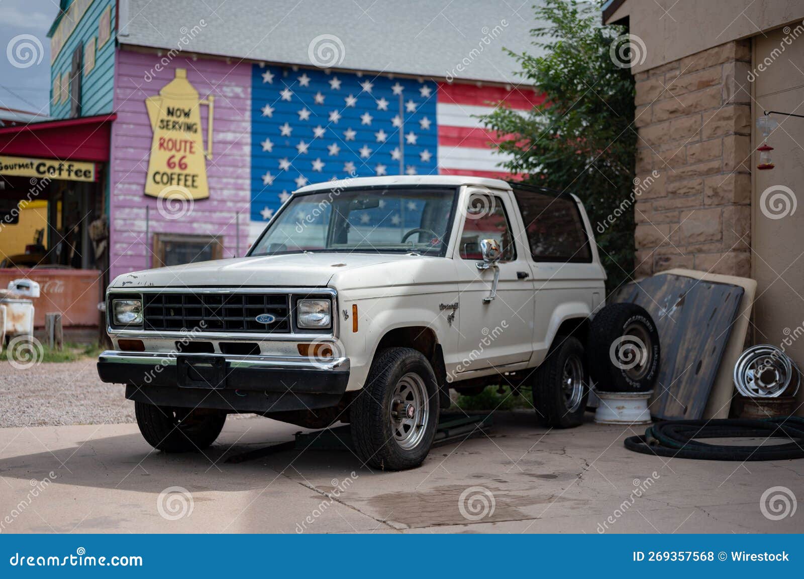 Old White Ford Bronco Third Generation Parked with the USA Flag on the ...