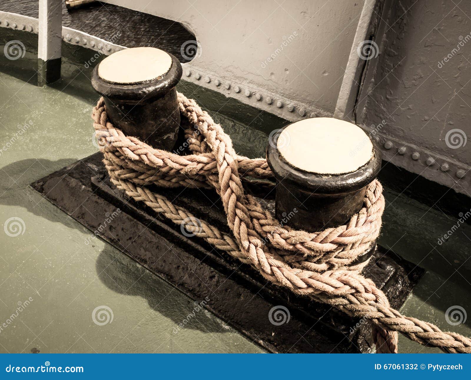 Old winch with ship rope stock photo. Image of cleat - 67061332