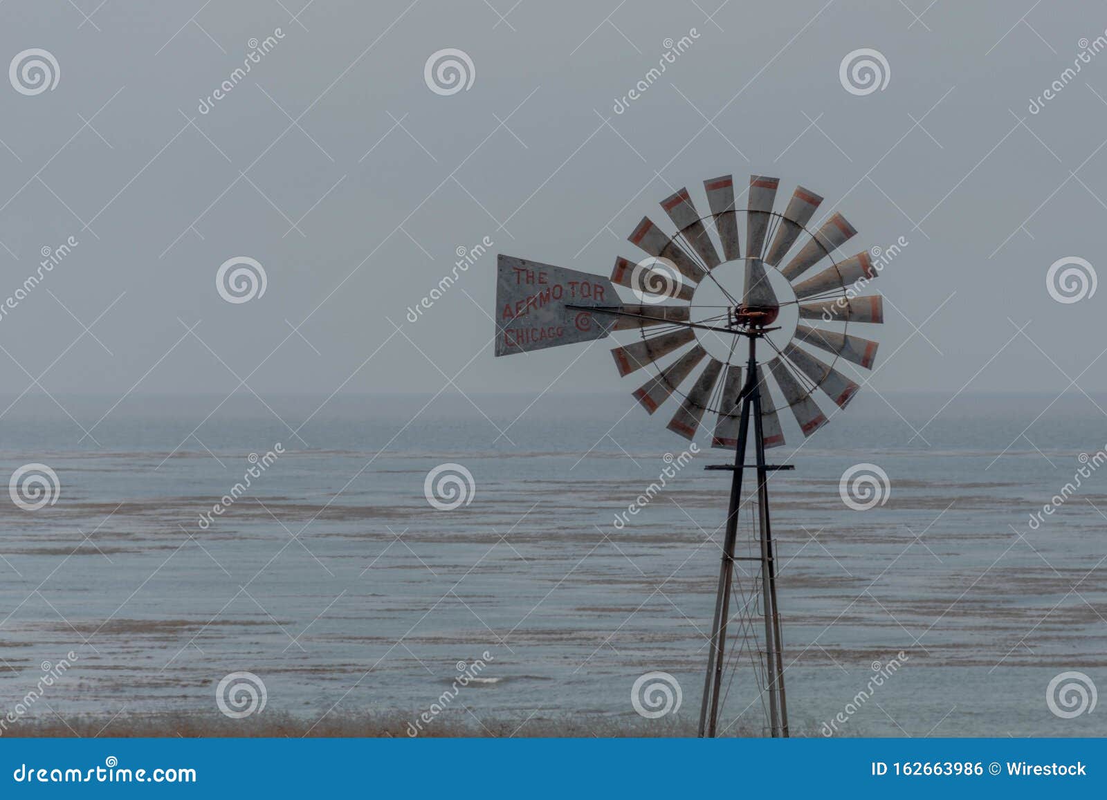 Old Windmill by the beach editorial photo. Image of wind - 162663986