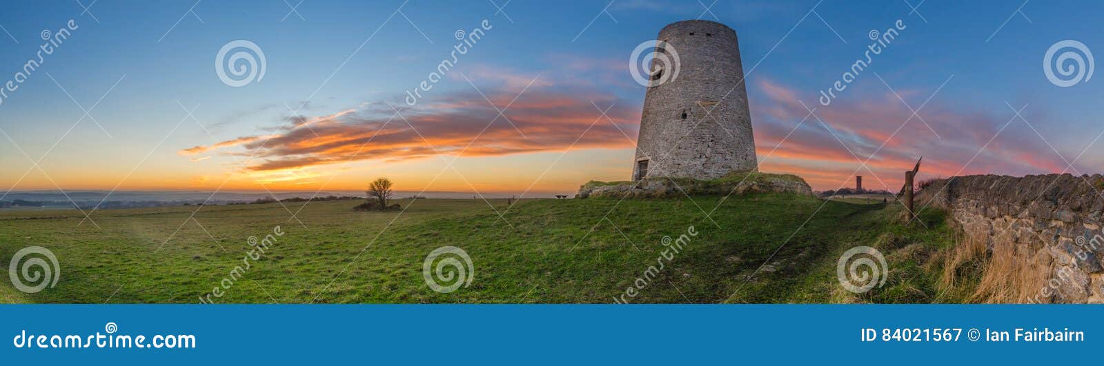 Old Windmill at sunset stock image. Image of background - 84021567