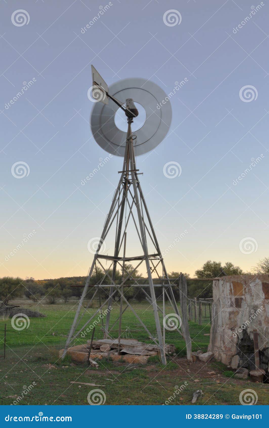 Old Windmill at sunset stock image. Image of fence, spinning - 38824289