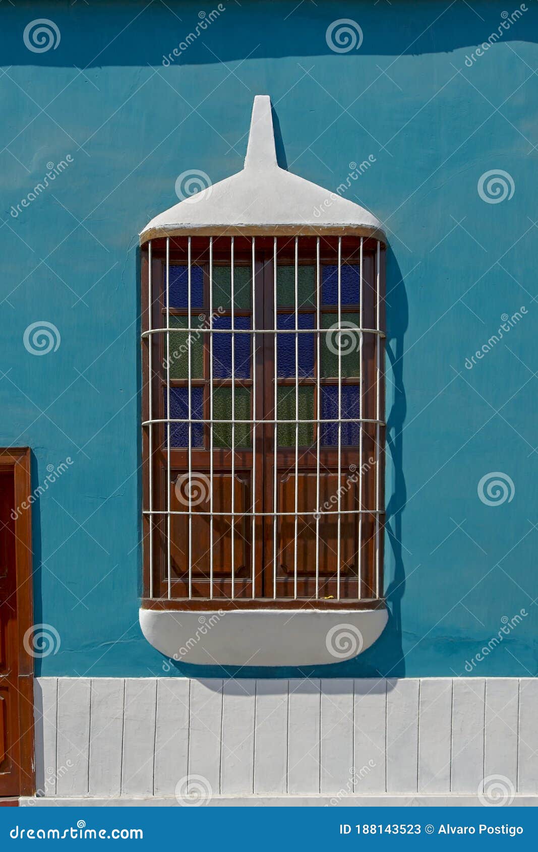 Old Window with Bars on a Colorful Facade Stock Image - Image of light ...
