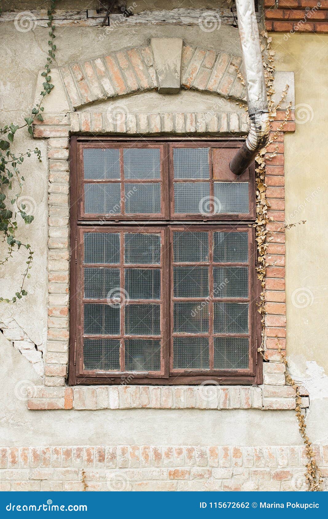 Old Window on Old Building Facade, with Decorative Brick Frame Stock ...