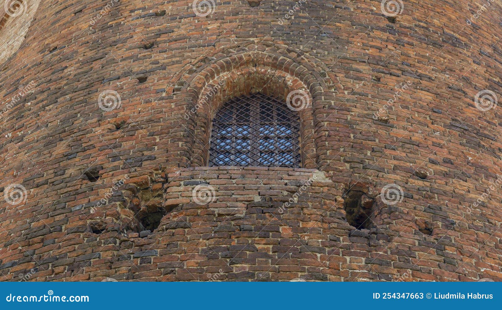 Old Window in the Castle. Window with Bars in an Old Brick Wall Stock ...